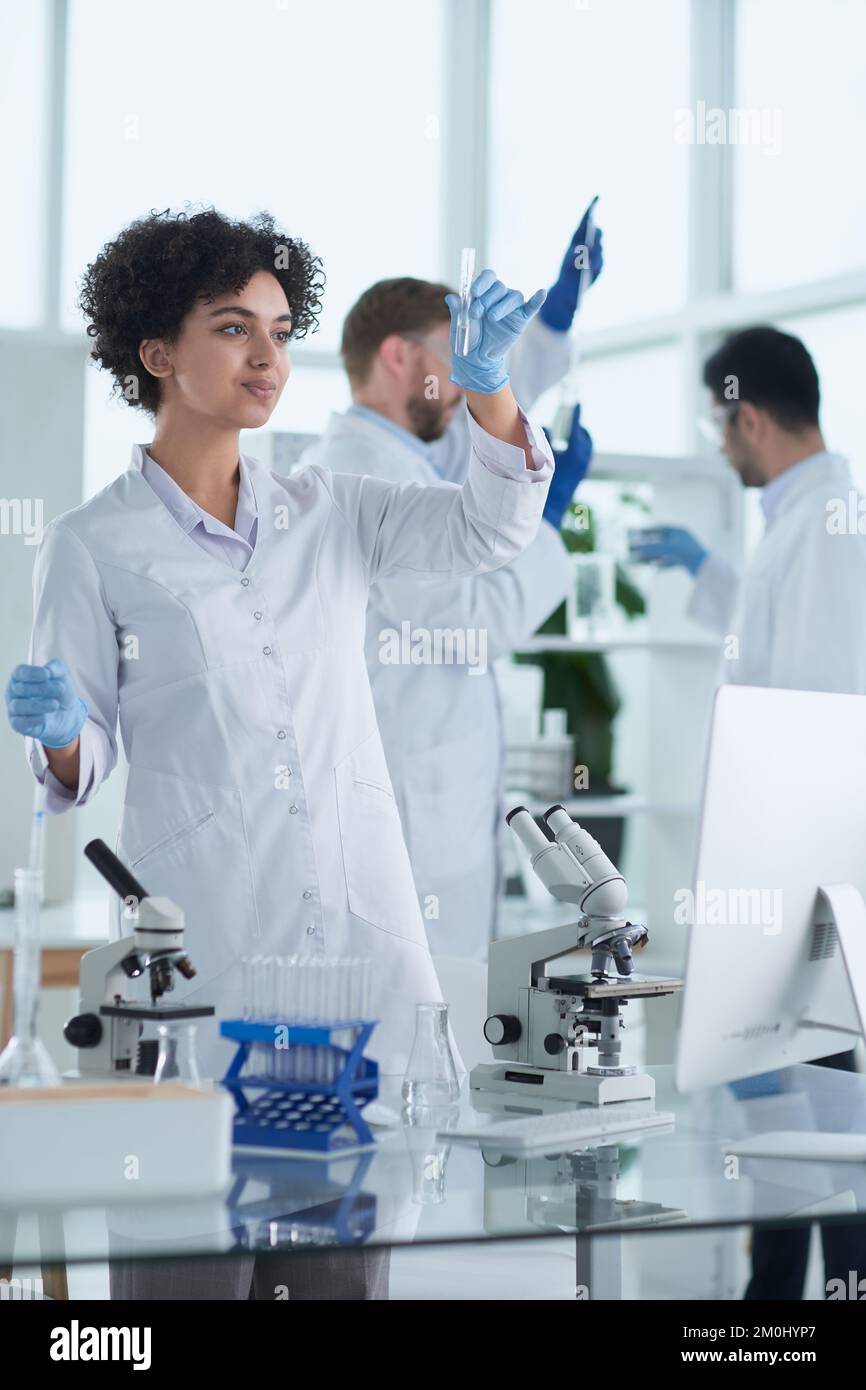 Team of Medical Research Scientists Working on Generation Experimental ...