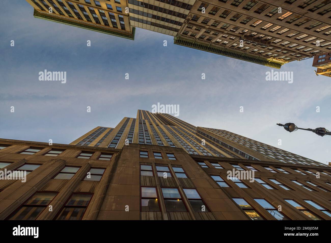 Upwards view on blue sky between skyscrapers. Downtown Manhattan New ...