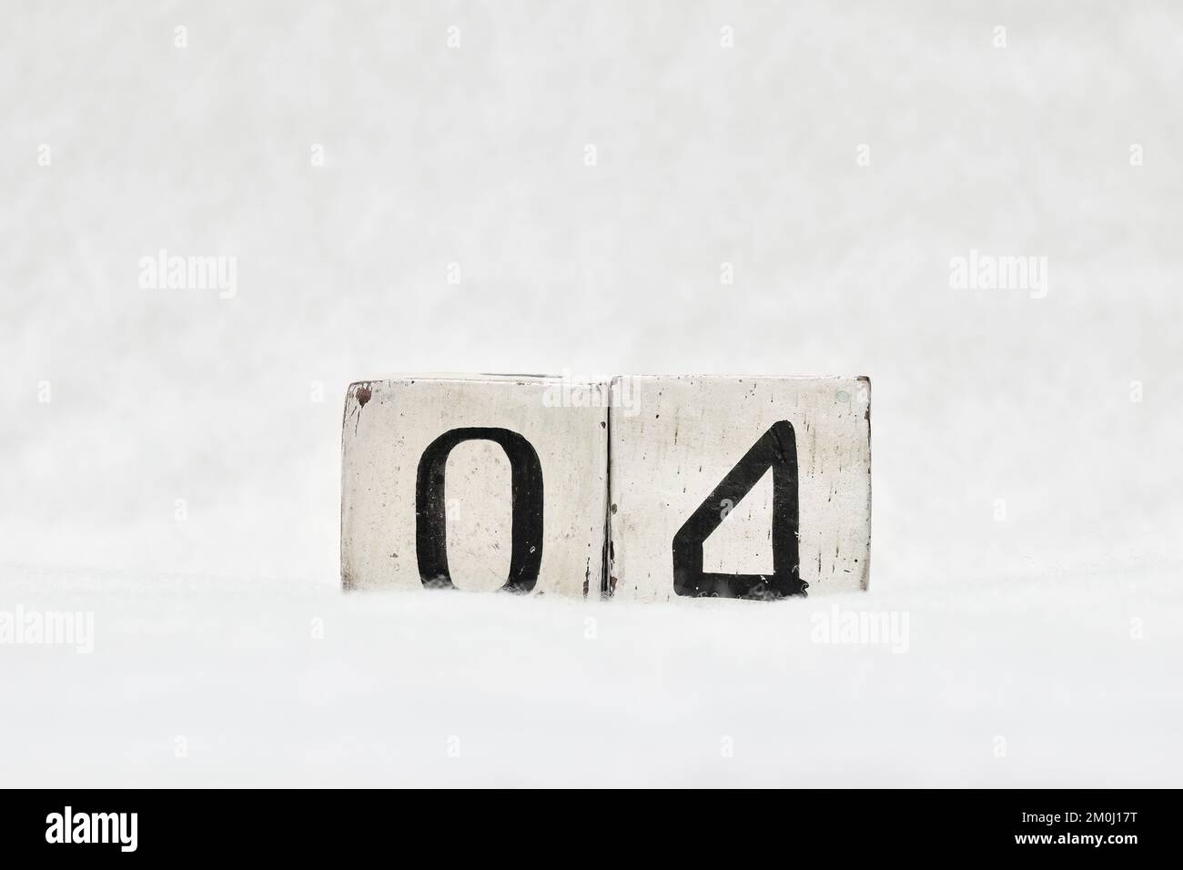 04 vintage wooden block calendar number on white mottled background ...