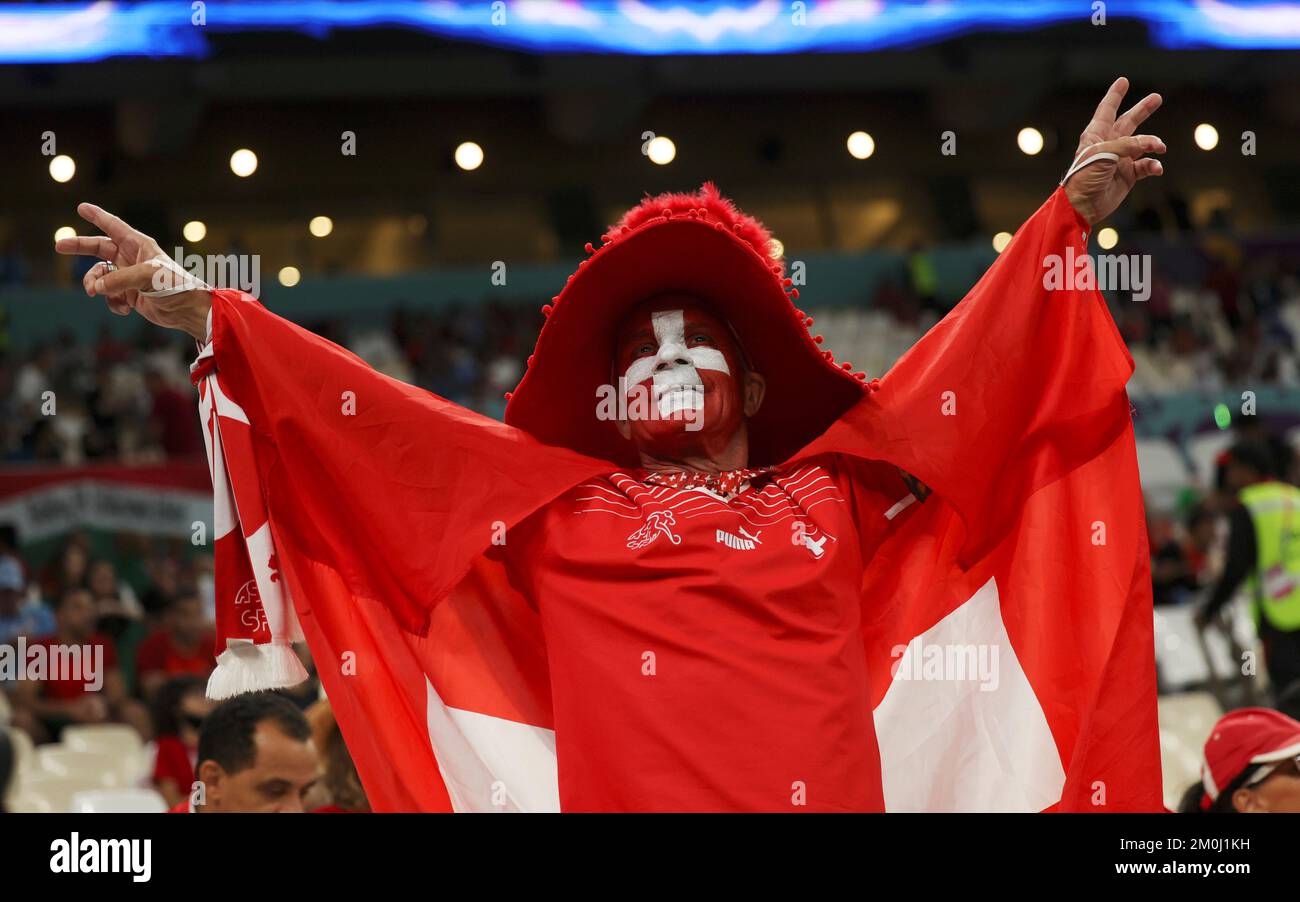 Lusail, Qatar. 6th Dec, 2022. A fan cheers prior to the Round of 16 ...