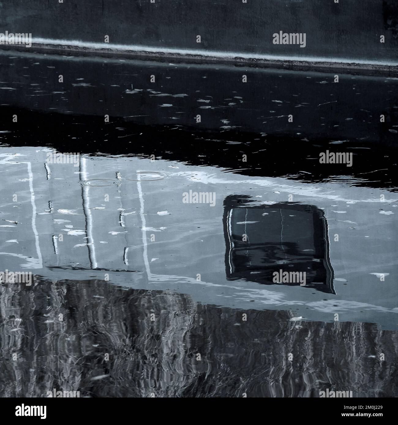 Abstract photograph, showing reflected pattern, line, shape, with a ...