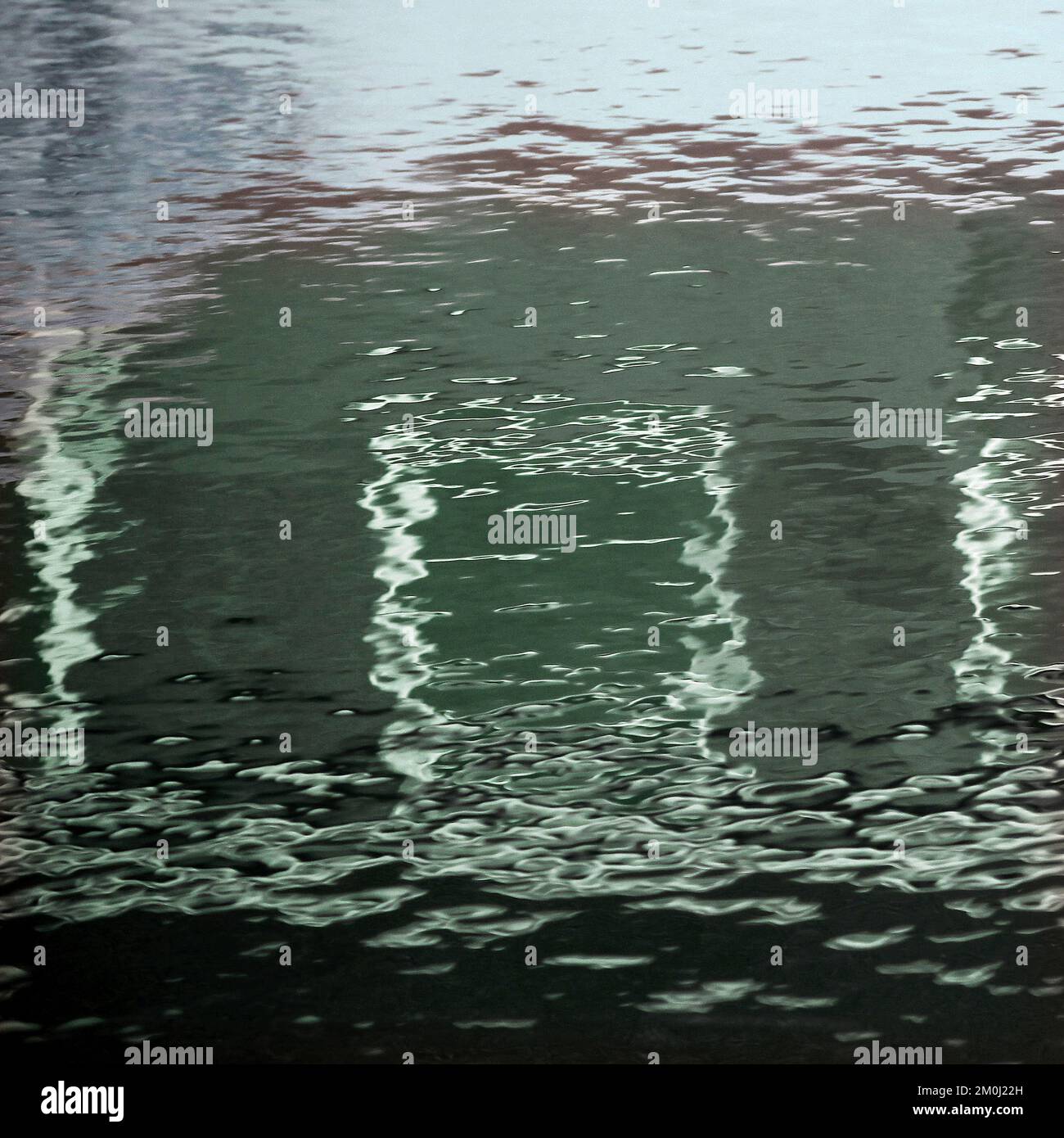 Abstract photograph, showing reflected pattern, line, shape, with a ...