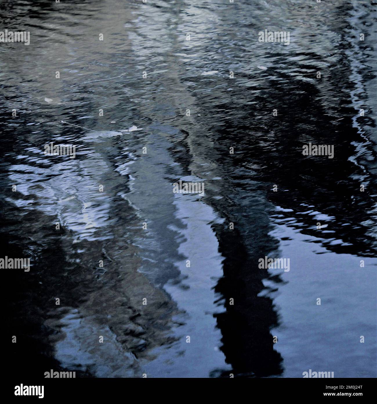 Abstract photograph, showing reflected pattern, line, shape, with a ...