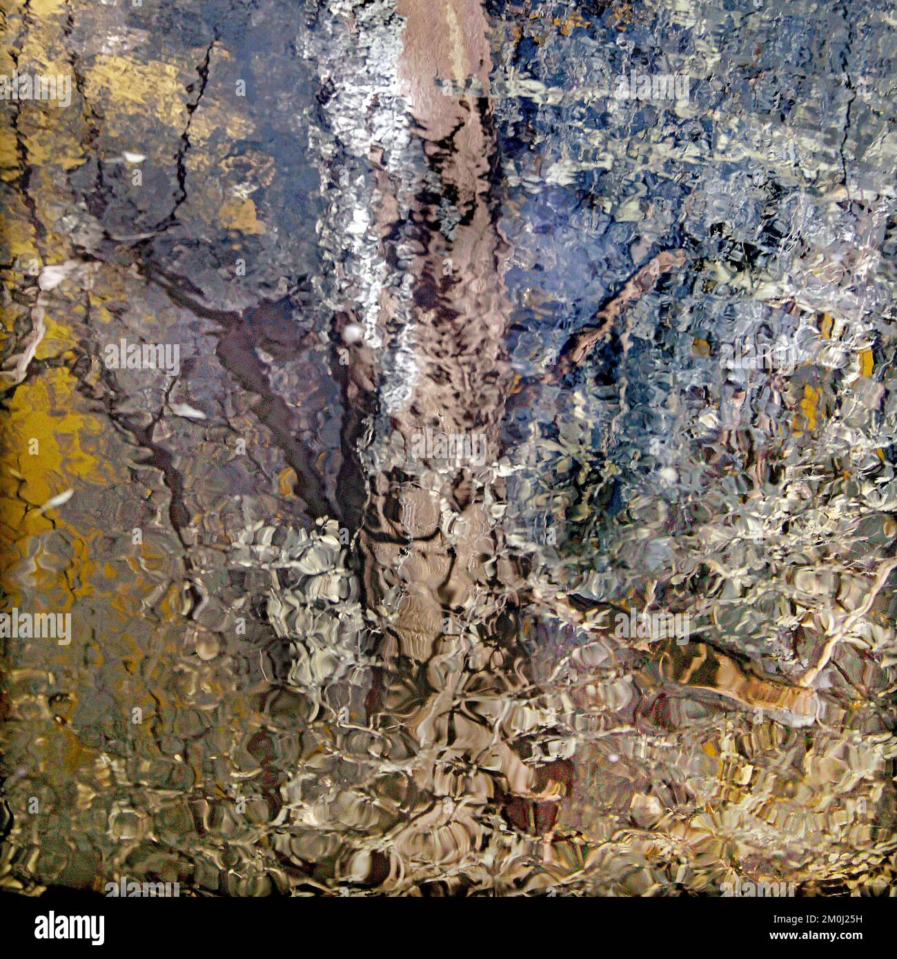 Abstract photograph, showing reflected pattern, line, shape, with a ...