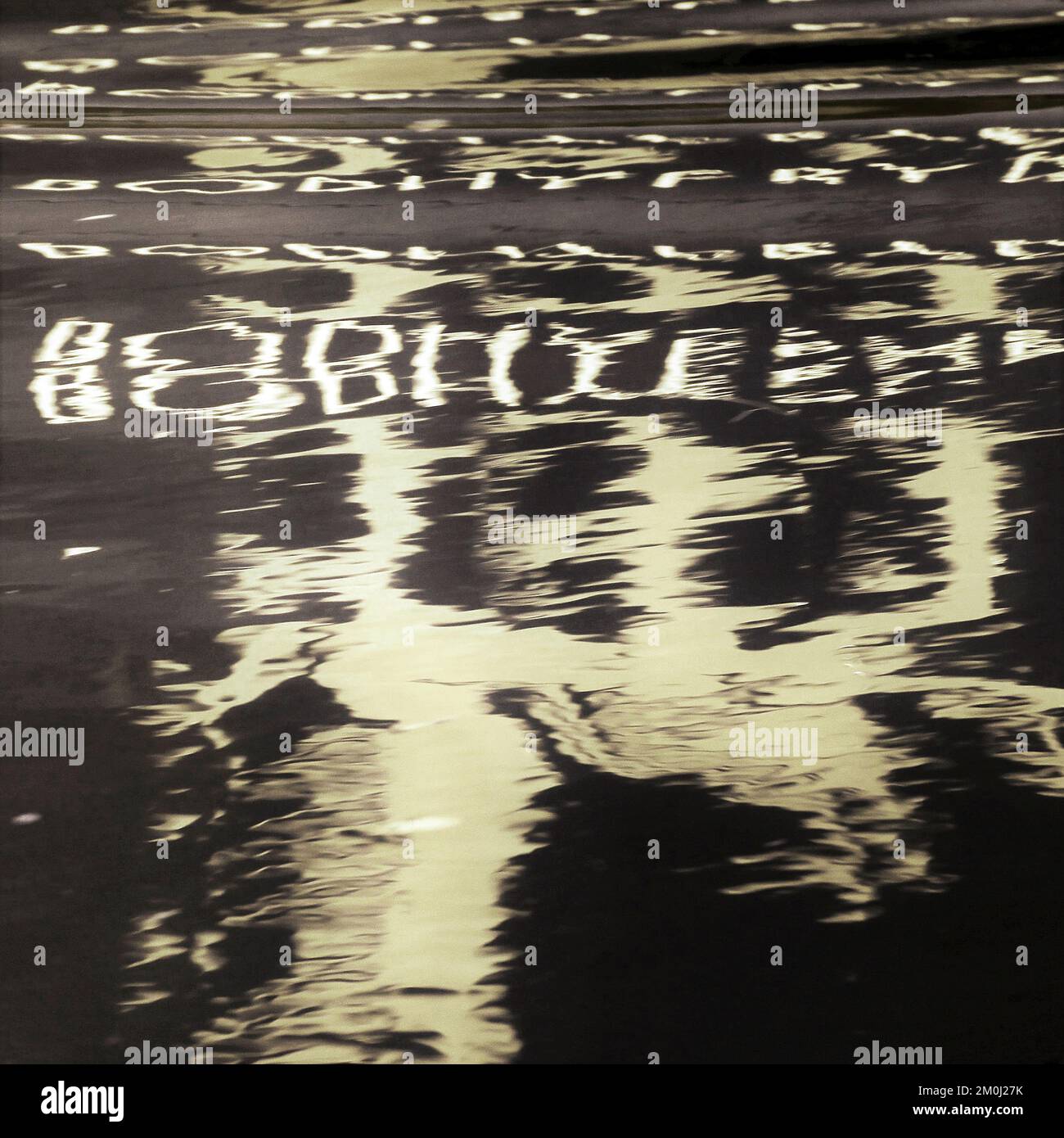 Abstract photograph, showing reflected pattern, line, shape, with a ...