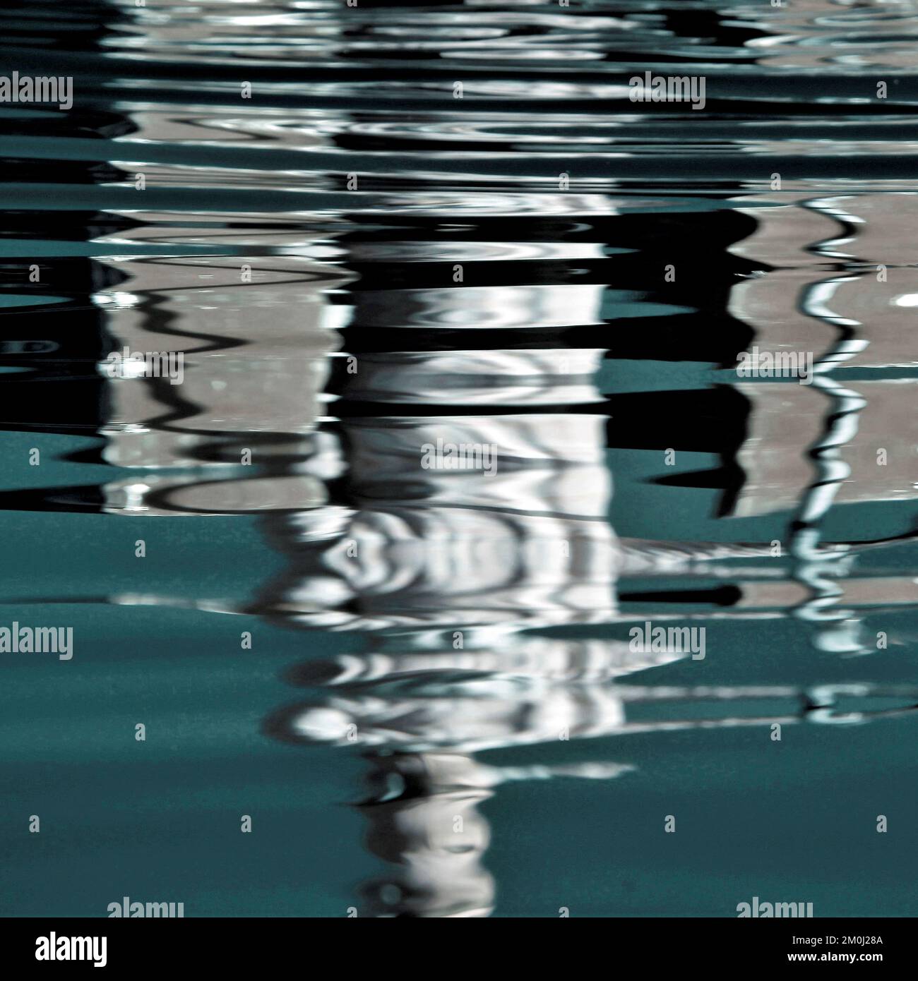 Abstract photograph, showing reflected pattern, line, shape, with a ...