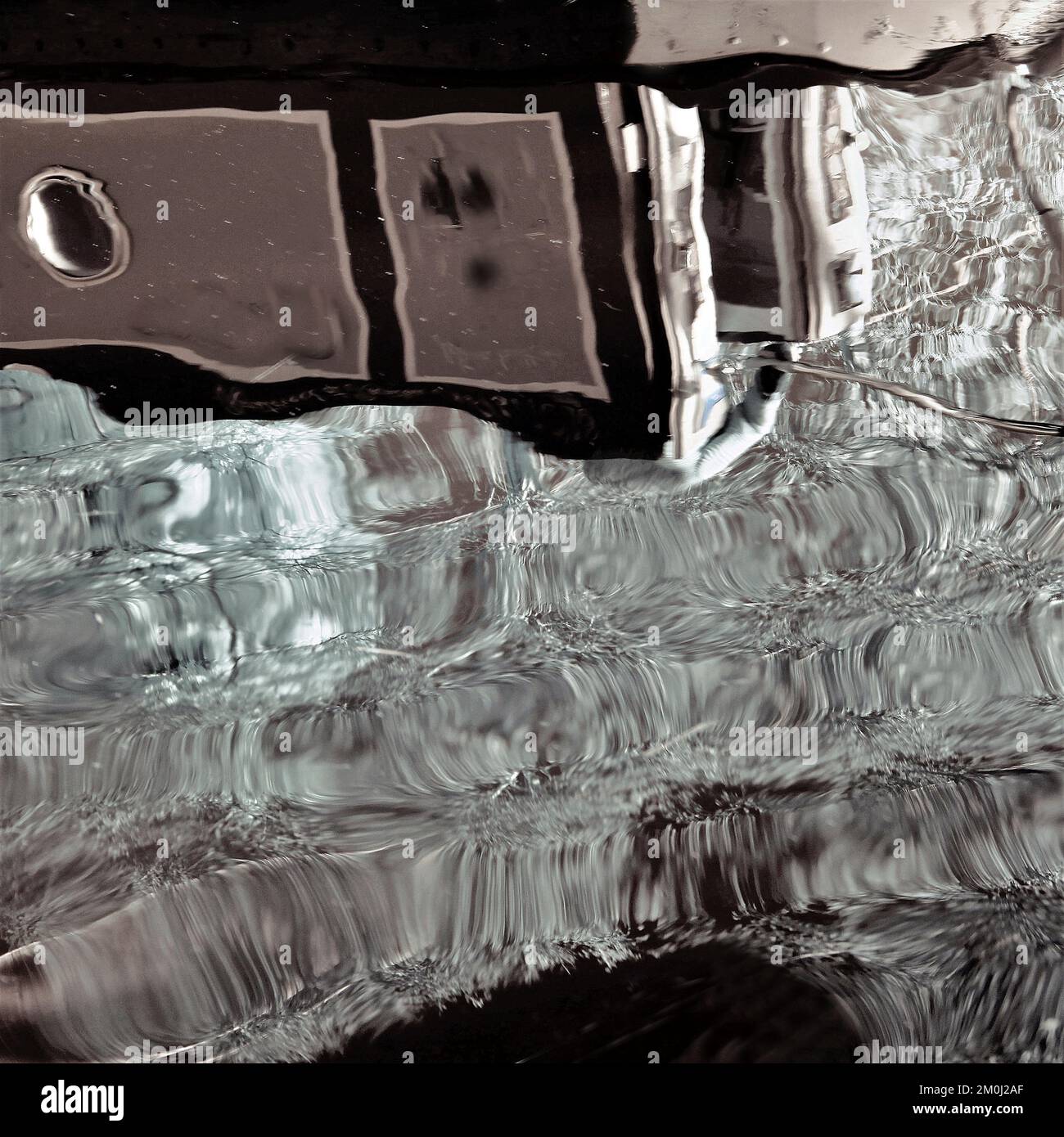 Abstract photograph, showing reflected pattern, line, shape, with a ...