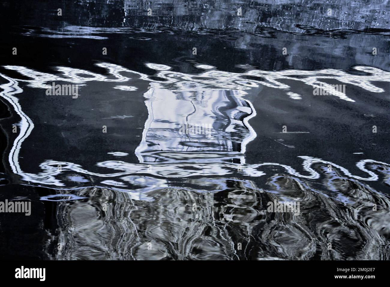 Abstract photograph, showing reflected pattern, line, shape, with a ...