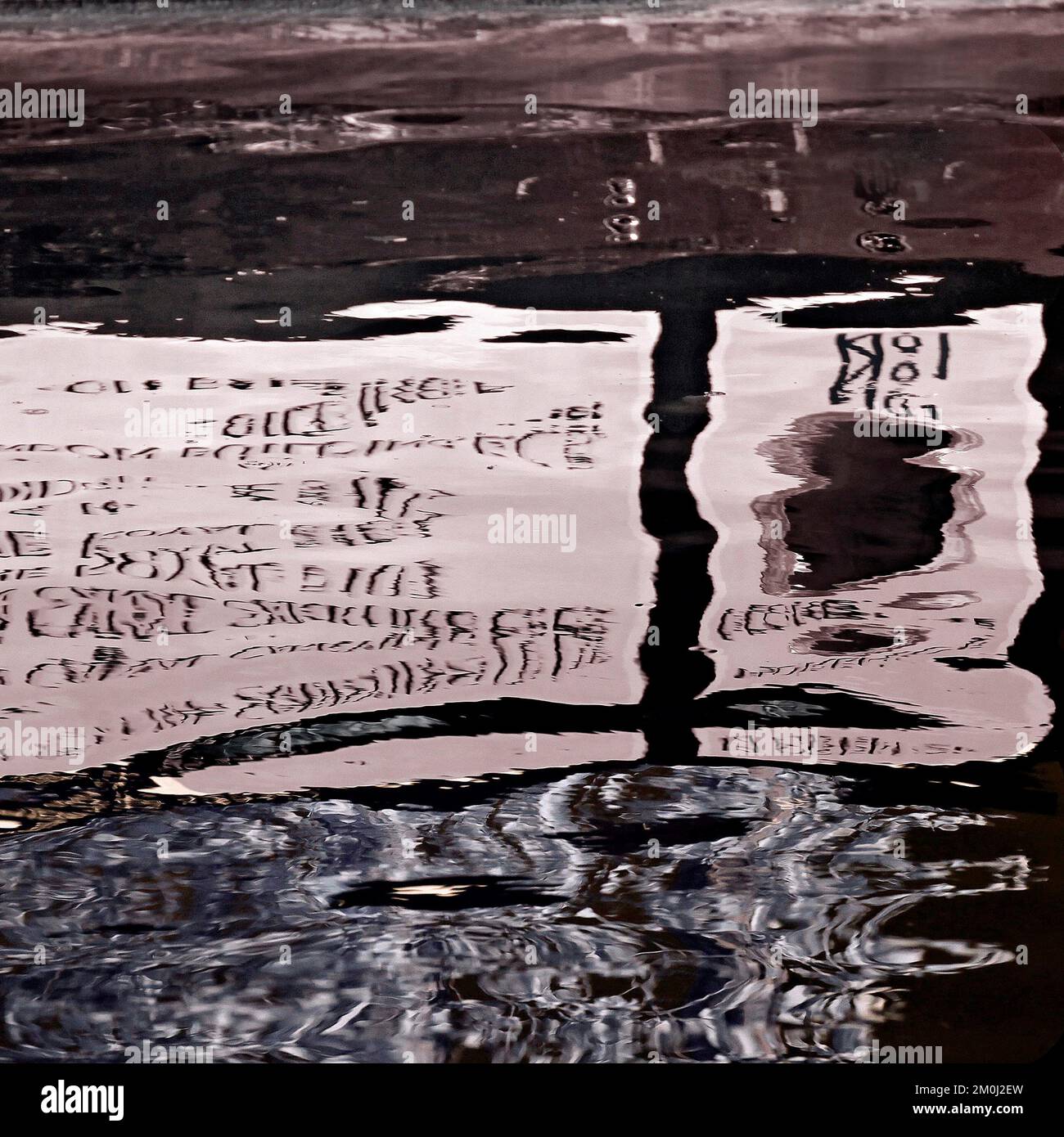 Abstract photograph, showing reflected pattern, line, shape, with a ...