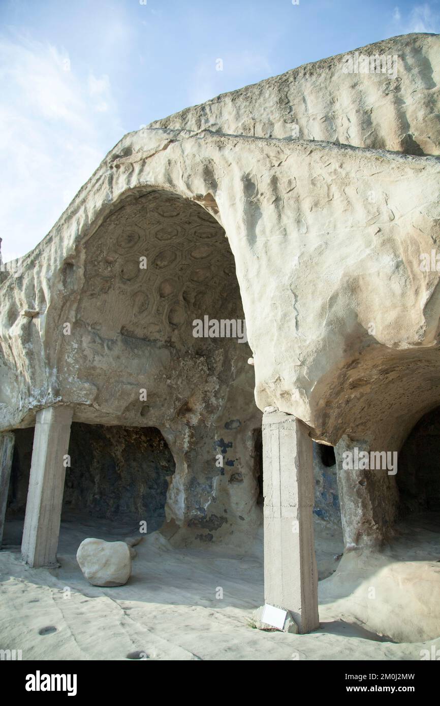 The structure with an arch and interior in Uplistsikhe ancient cave ...