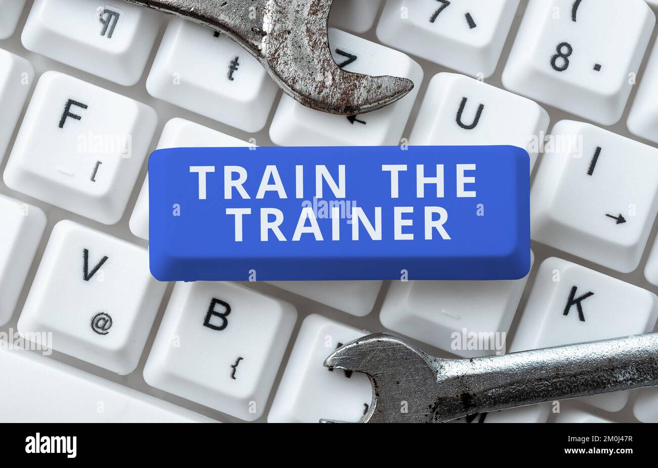 Hand writing sign Train The Trainer. Business approach identified to teach mentor or train ...