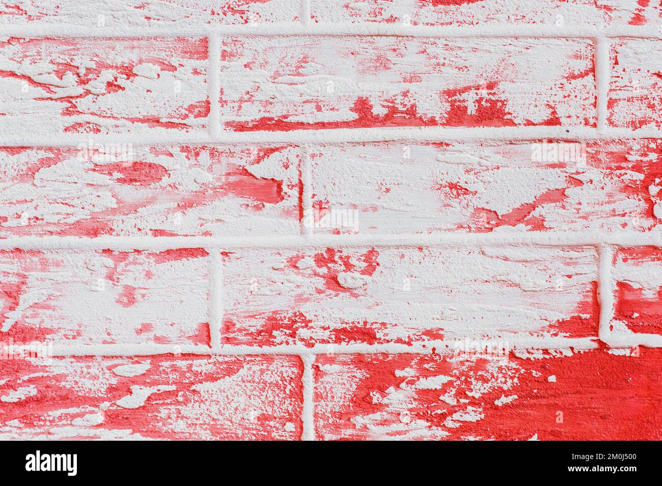 Light white brick wall with red decorative paint patterns texture ...