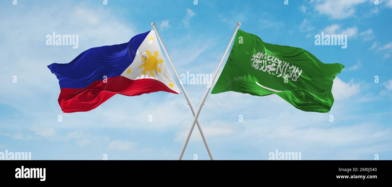 two crossed flags Saudi Arabia and Philippines waving in wind at cloudy ...