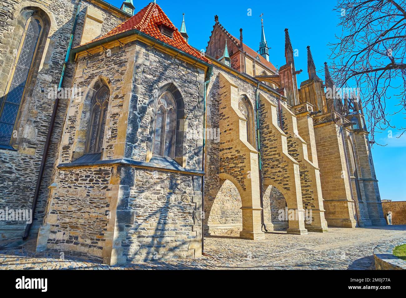 The side wall of medieval St Bartholomew Parish Church with massive ...