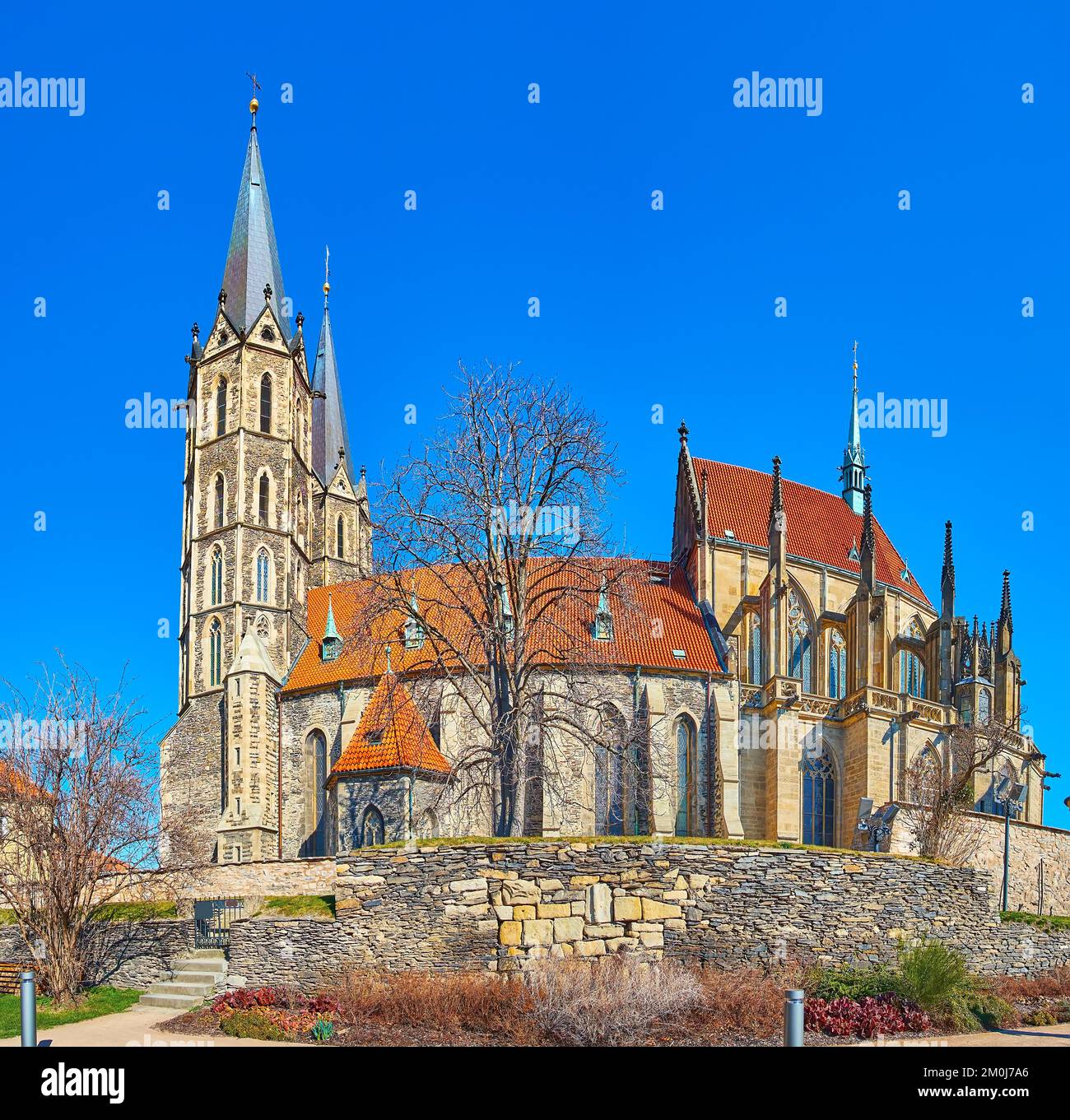 The medieval Gothic St Bartholomew Church with rampart and Zahrady na ...