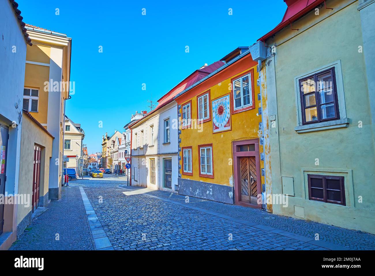 The line of old small houses on Brandlova Street, one of them is ...