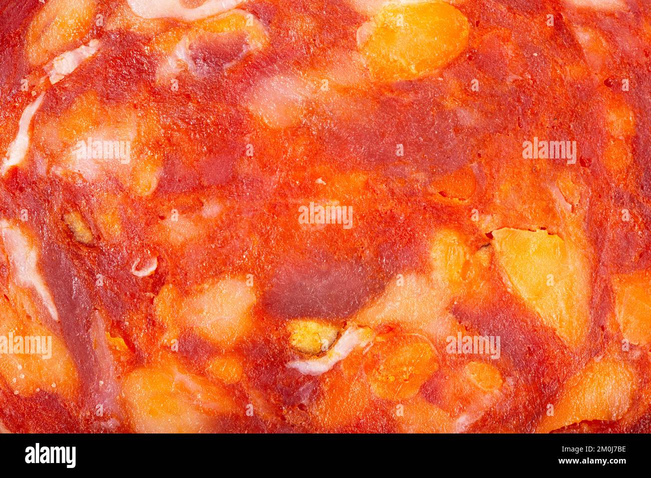 Pepperoni salami texture as background. A close shot of pepperoni ...
