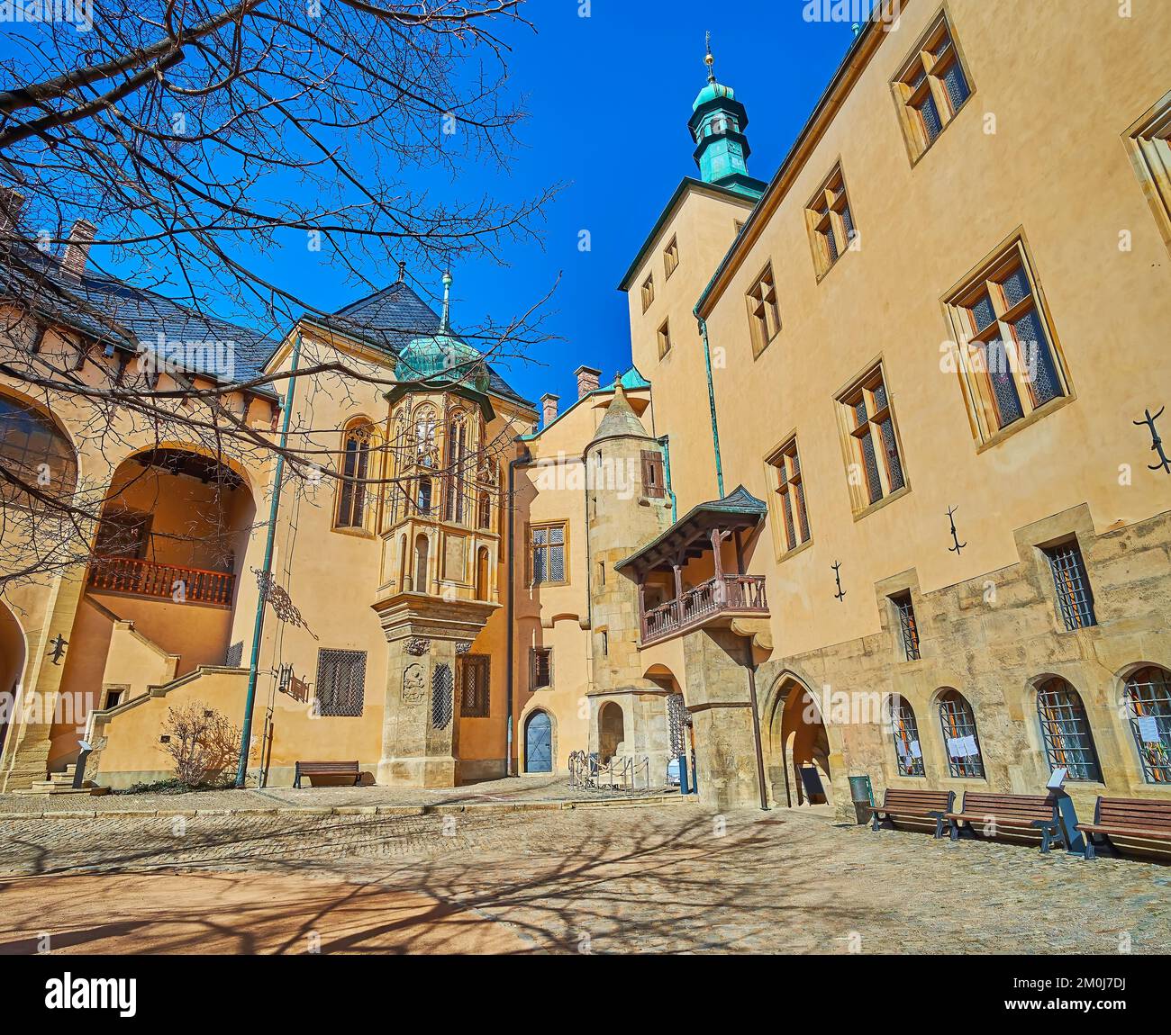 The carved stone courtyard of the medieval Italian Court Palace, Kutna ...