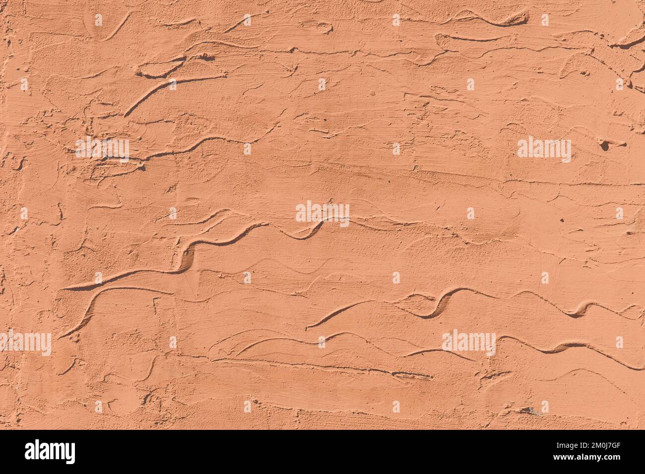 Light brown plaster wall with abstract stucco pattern texture surface ...