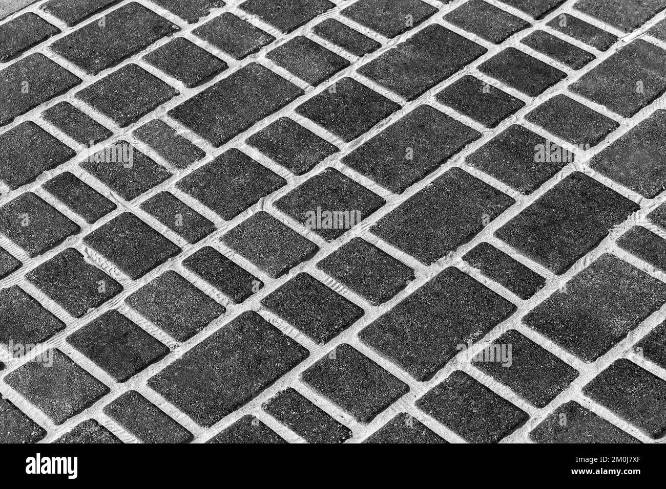 Black dark stone paving slabs floor tile urban texture street road ...