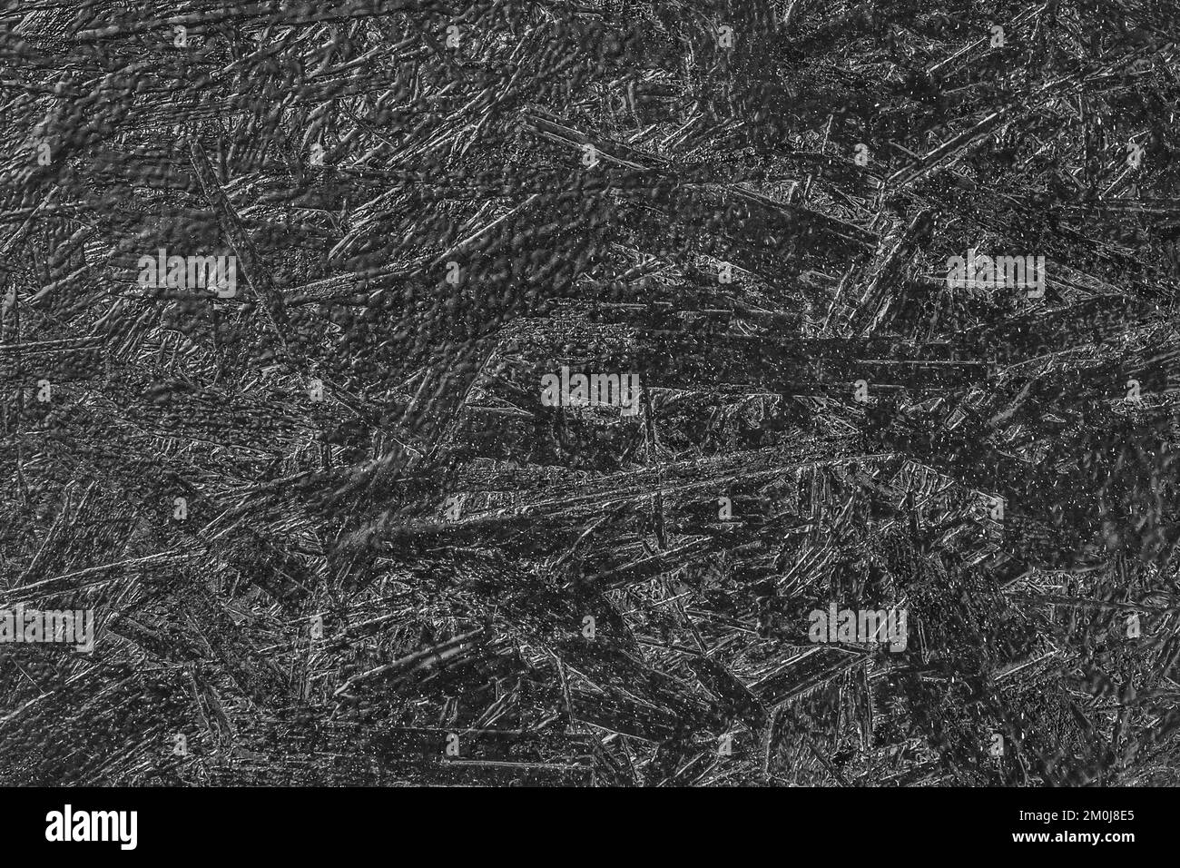 Black paint pressed wood texture, chipboard dark surface pattern ...