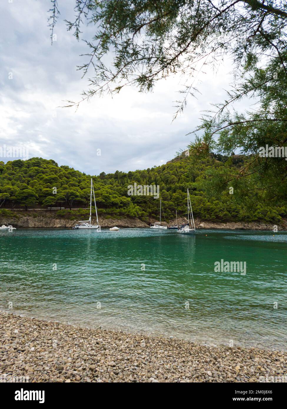 A view at green bay of Asos village, greek nature and turquoise Ionian ...