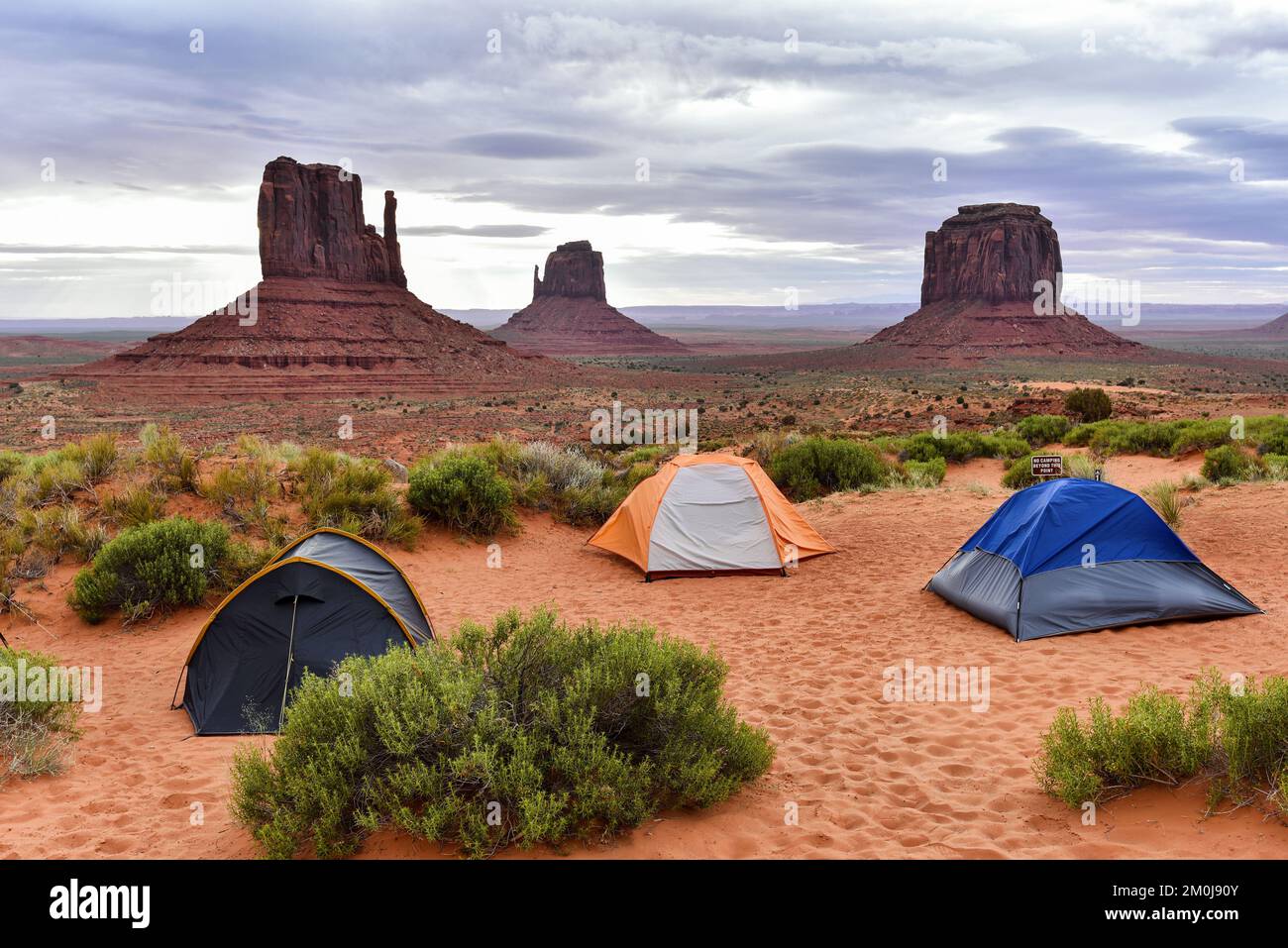 View on the famous Monument Valley from campsite with three tents in ...