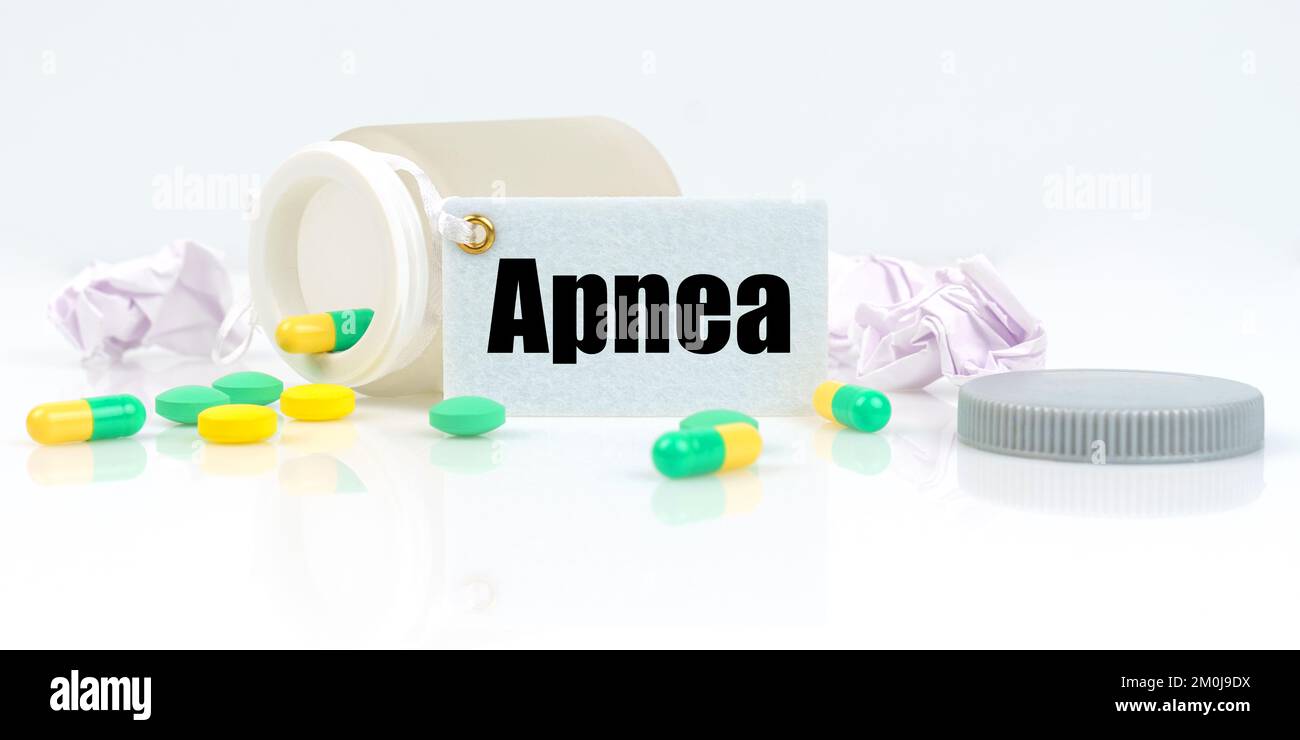 Medicine and health concept. On a white reflective background, there ...