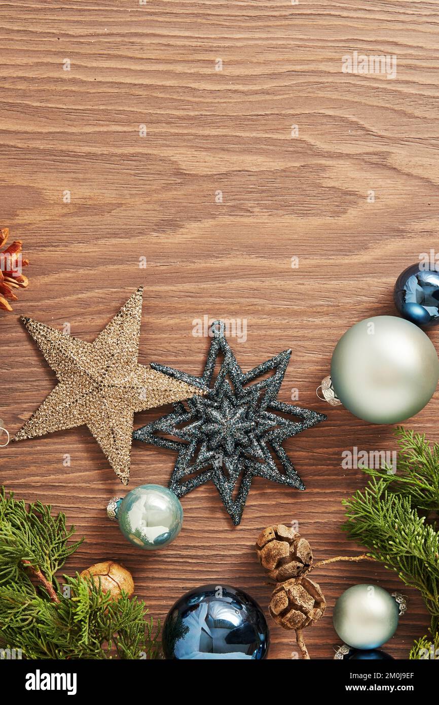 Christmas decorations, blue glass balls, stars and snowflakes with ...