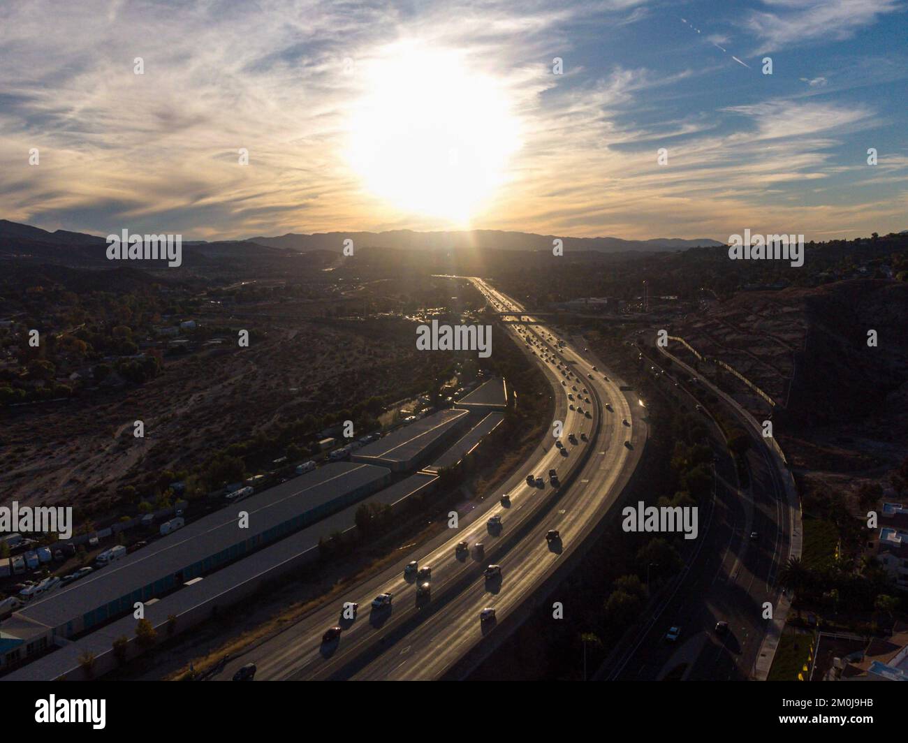 An aerial view of a freeway near the forest in Canyon Country, USA ...