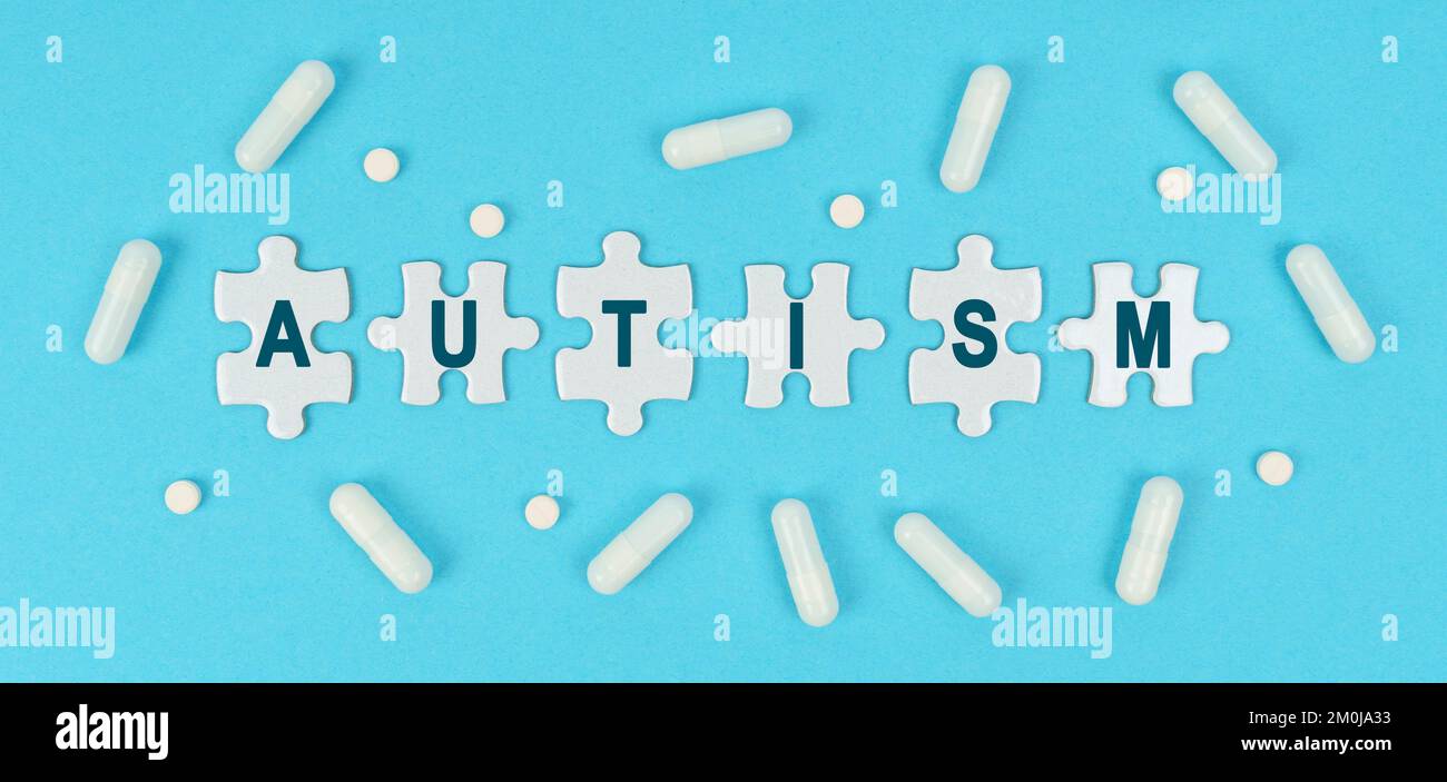 Medicine and health. On a blue background, there are pills and puzzles ...