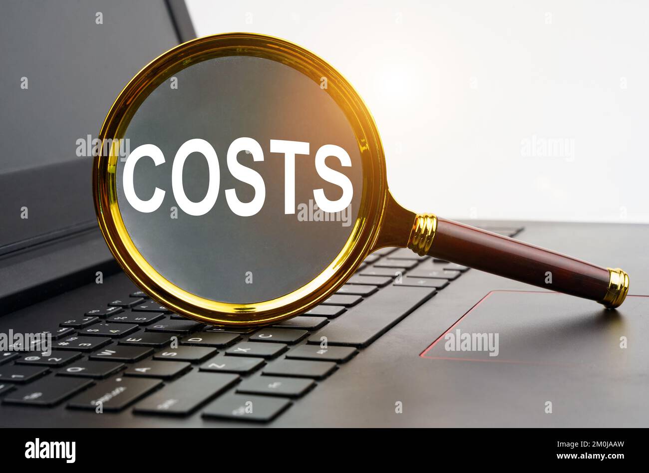 Business and finance concept. There is a laptop on the table with a ...