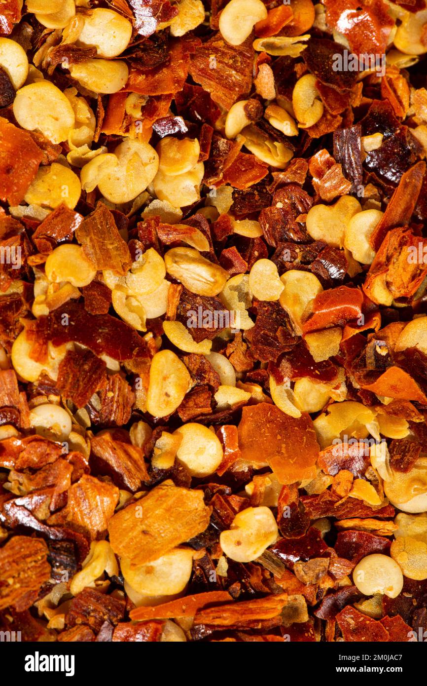 The texture of dried chilli peppers as a background. A close shot of ...