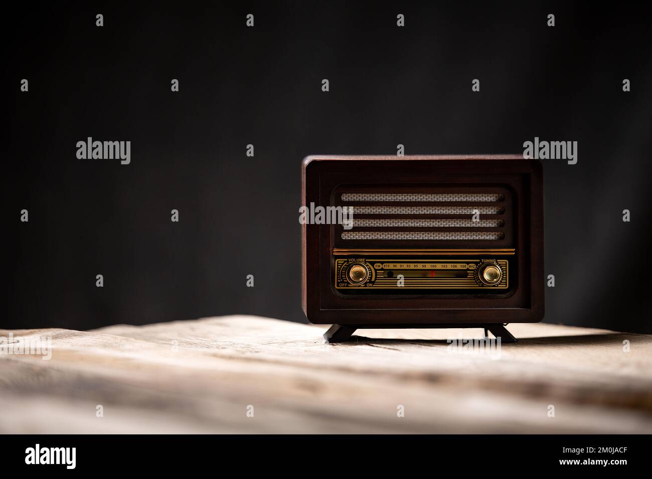 Old brown radio, retro radio on wooden table. Perspective vintage radio ...