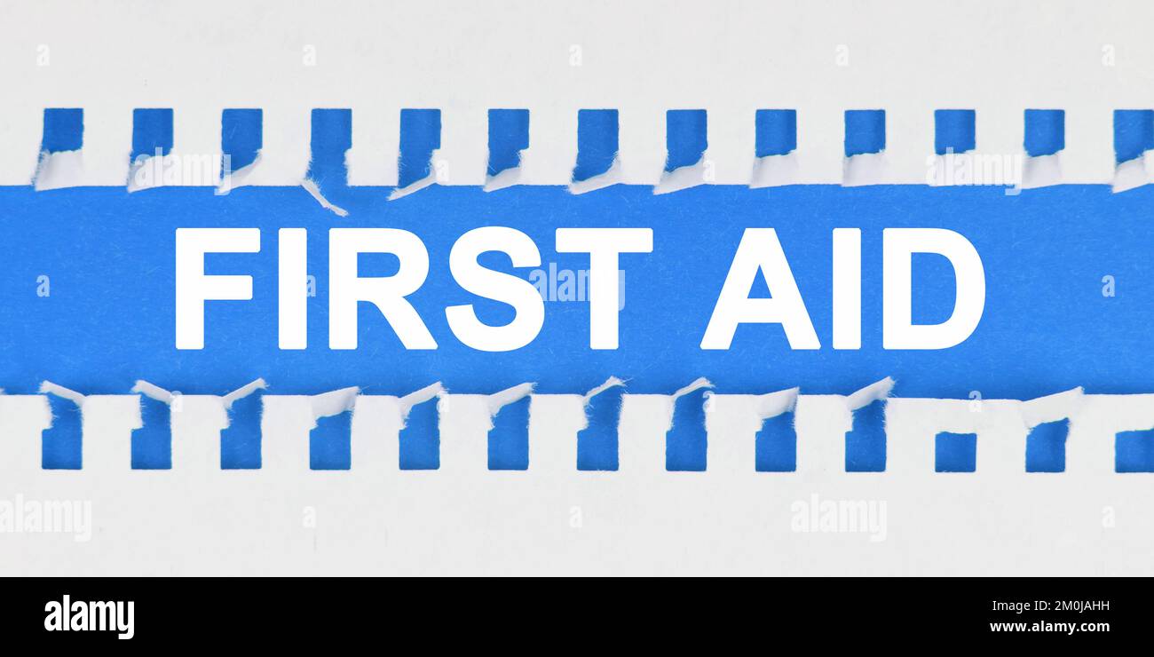 Medicine and health concept. Between two sheets of a notebook on a blue ...