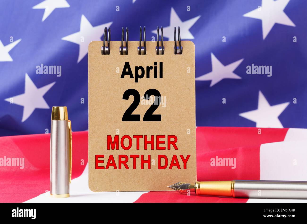 USA Holidays. Against the background of the US flag lies cardboard with ...