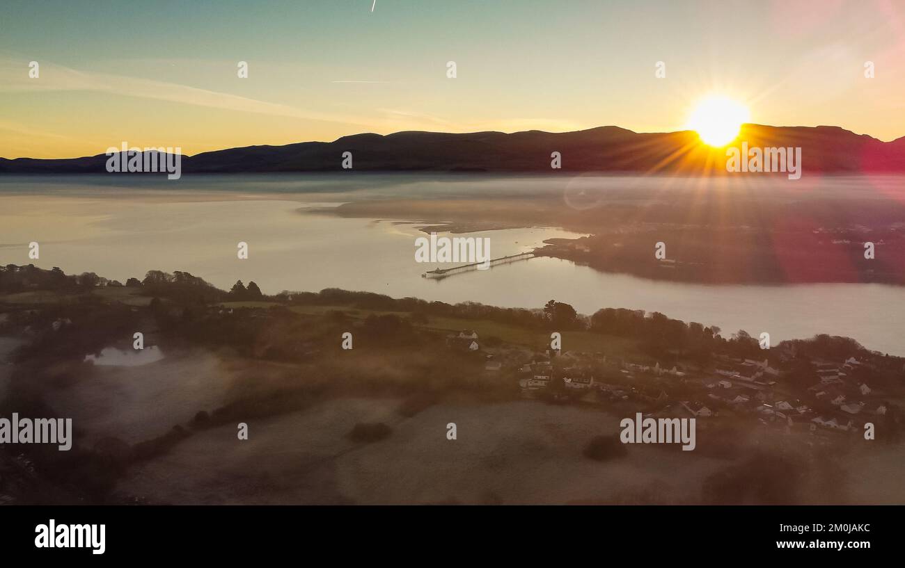 Sun rising over a mountainous coastal area, a beautiful landscape Stock ...