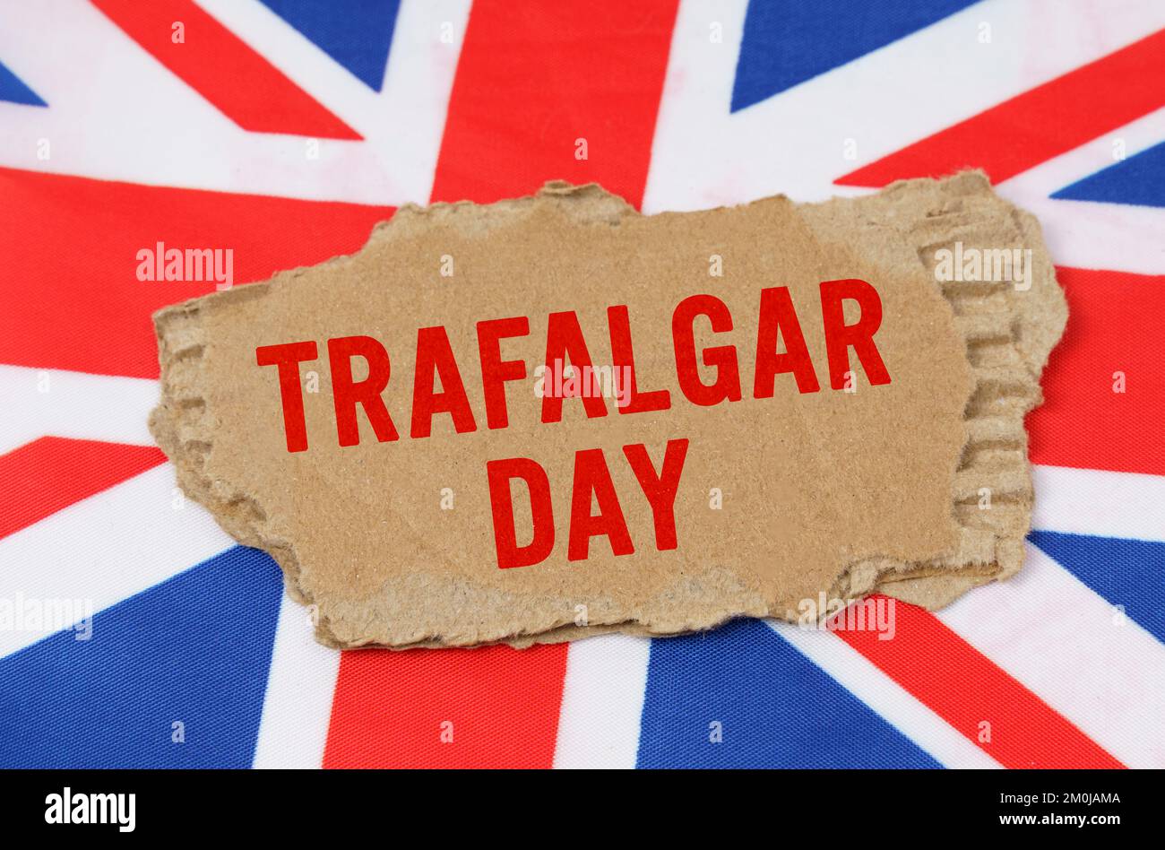 Holidays of the UK. Against the background of the flag of Great Britain lies cardboard with the ...