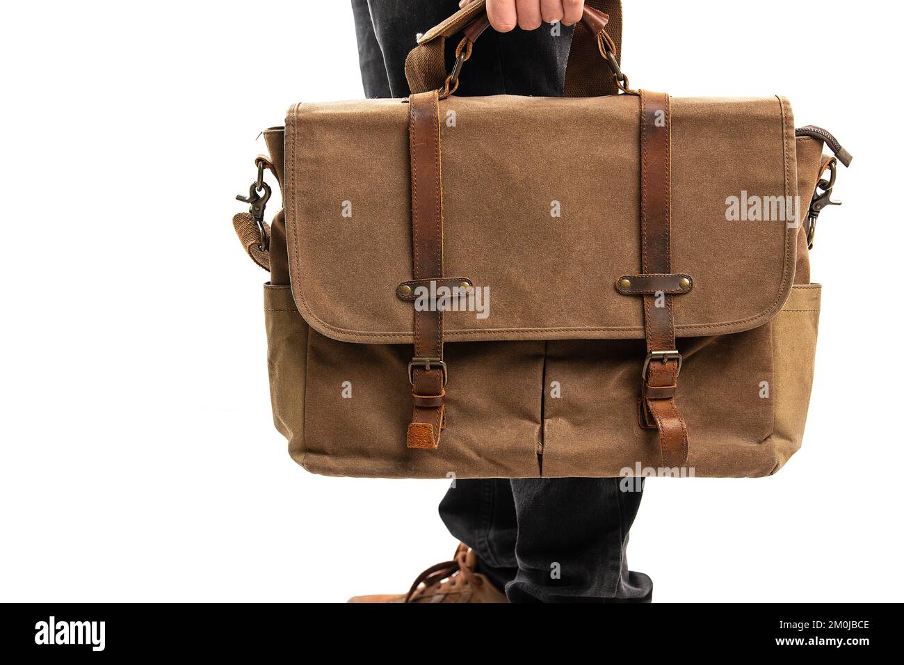 man carrying laptop bag, documents and laptop Stock Photo - Alamy