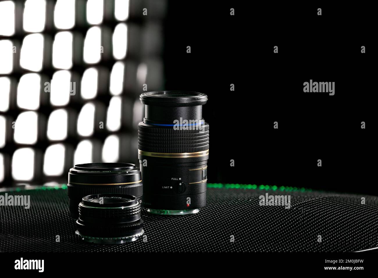 Camera lenses taken in a photo studio (28mm - 50mm 90mm Stock Photo - Alamy