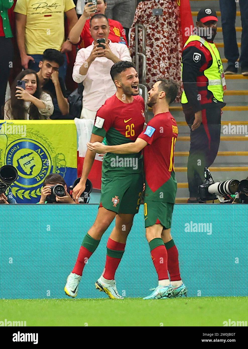 Lusail, Qatar. 6th Dec, 2022. Goncalo Ramos (L) and Ruben Dias of ...