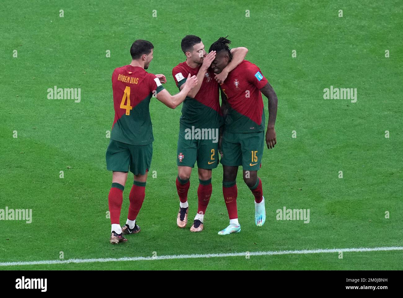 Portugal's Rafael Leao (right) celebrates scoring their side's sixth ...