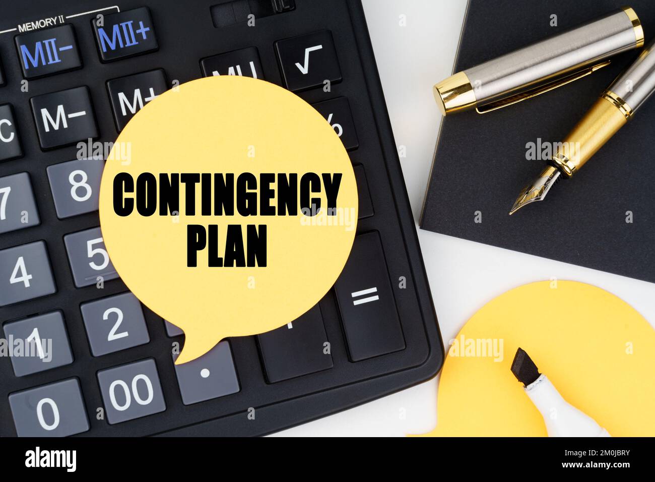 Business and economy concept. There is a calculator, a pen, a marker ...