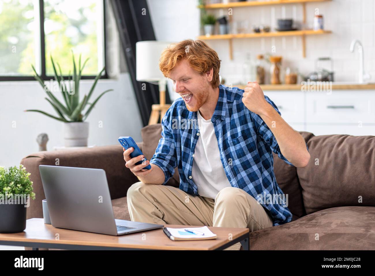 Happy excited redhead man hi-res stock photography and images - Alamy