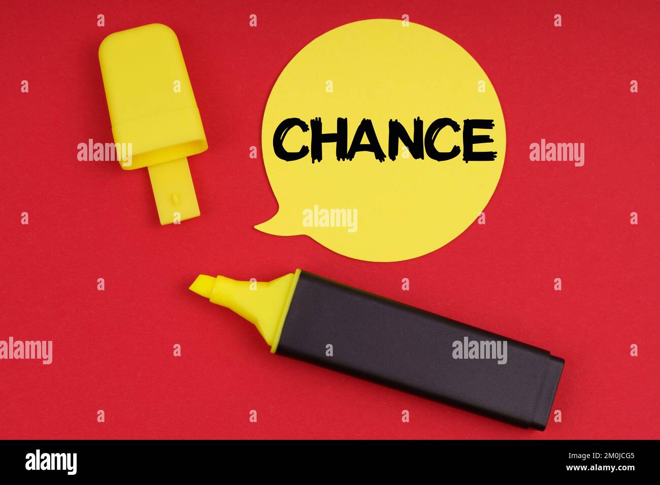 Business concept. On a red background is a marker and a sticker with ...