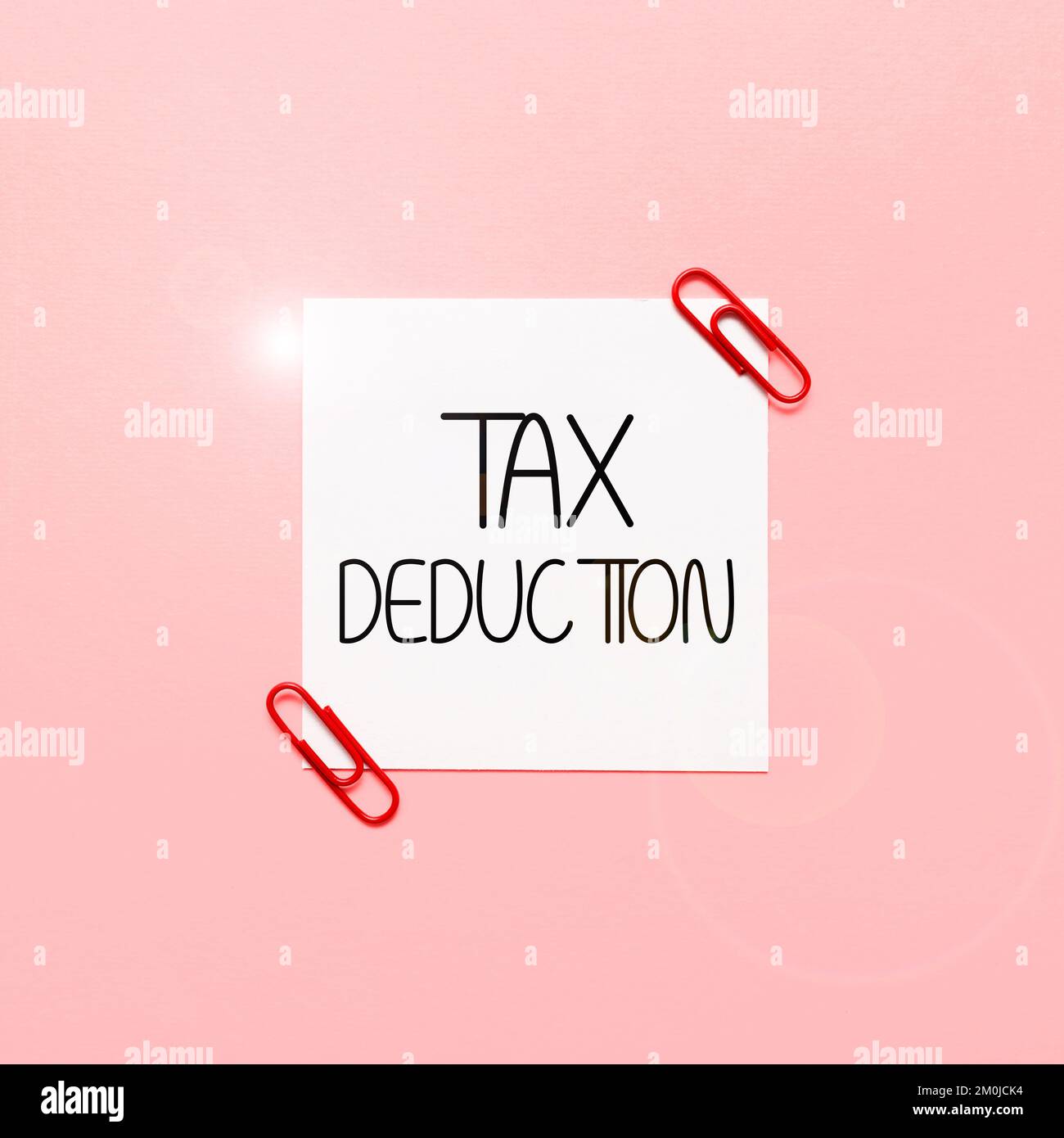 Conceptual caption Tax Deduction. Word Written on amount subtracted ...