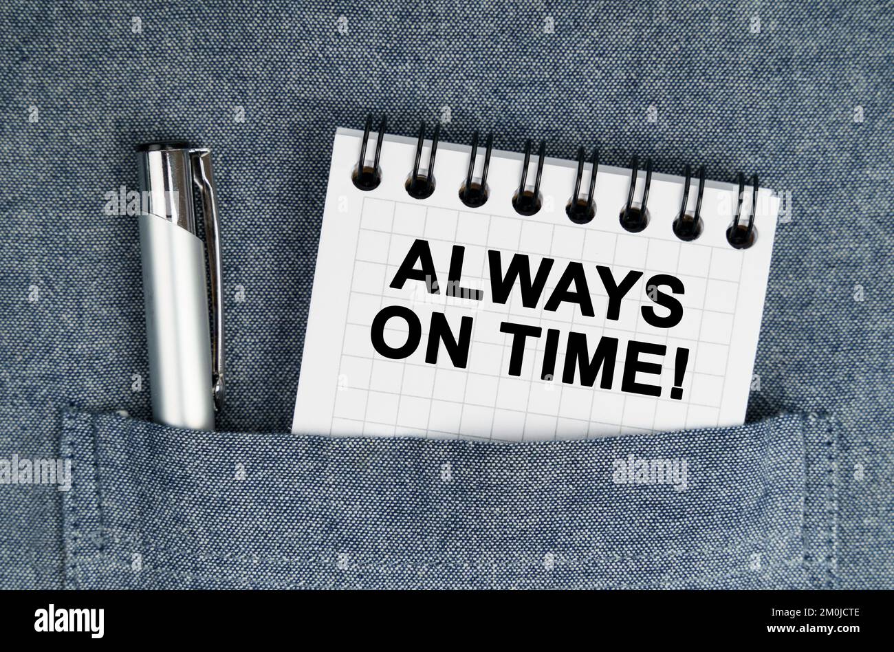 Business and finance concept. In my pocket is a pen and a notebook with ...