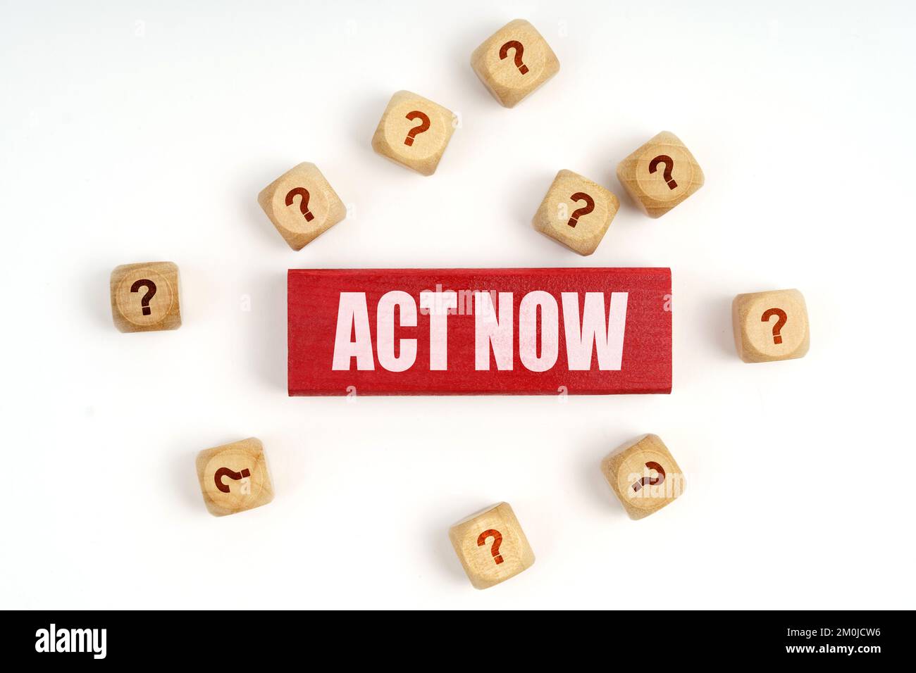 Question concept. On the table are cubes with questions and a red ...