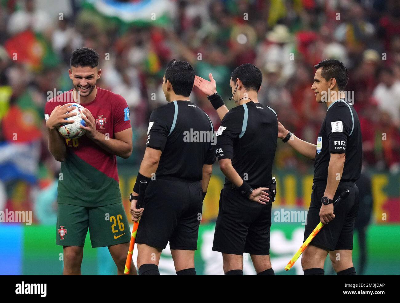 Portugal's Goncalo Ramos (left) celebrates with his hat-trick ball ...