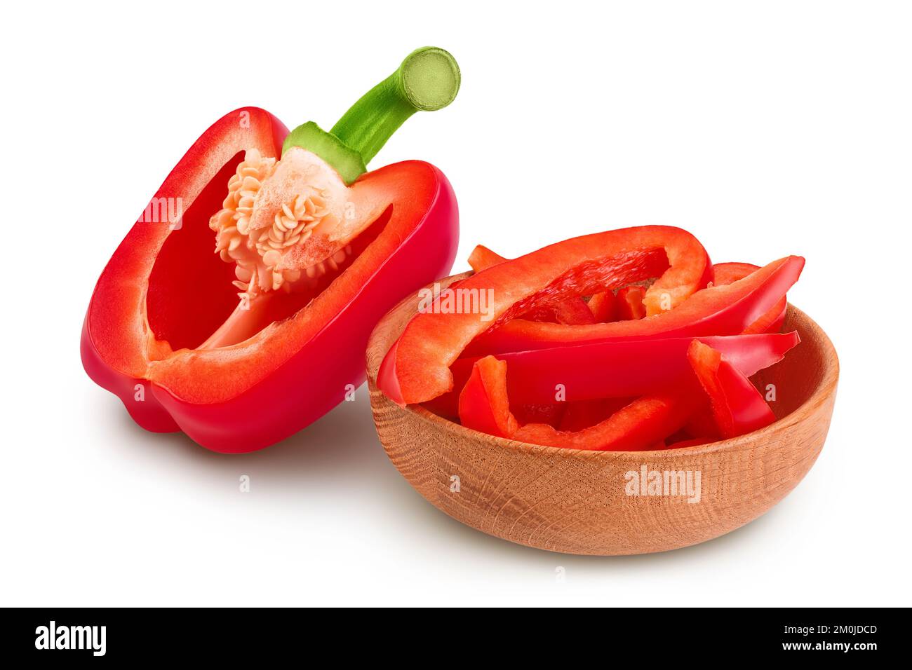 slices of red sweet bell pepper in wooden bowl isolated on white ...